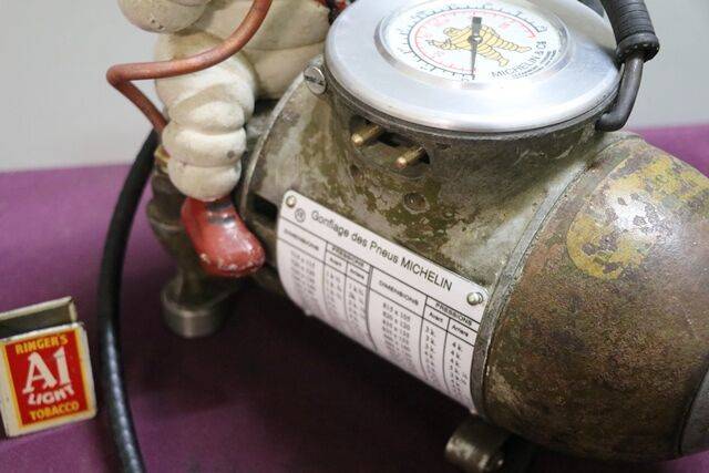A Vintage Michelin Bibendum Bomb Compressor. | XXXX Antique Complex