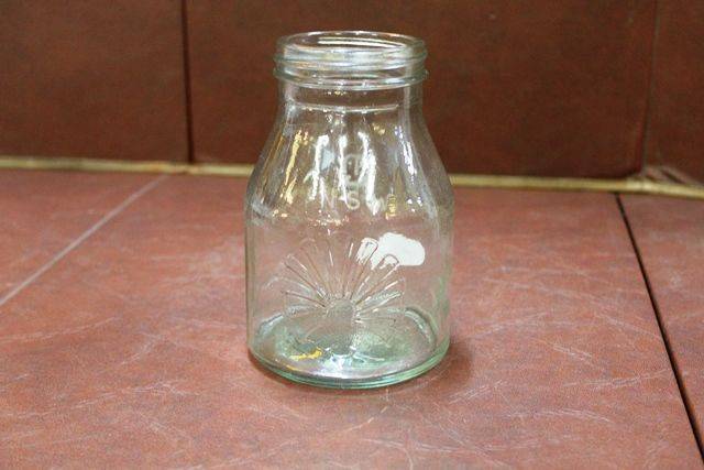 Early Embossed Shell Pint Oil Bottle | XXXX Antique Complex
