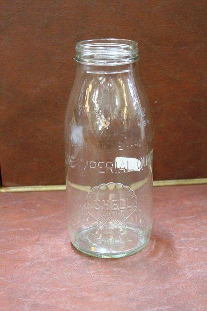 Embossed Shell Quart Oil Bottle | XXXX Antique Complex