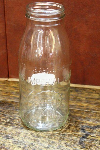 Embossed Shell Quart Oil Bottle | XXXX Antique Complex