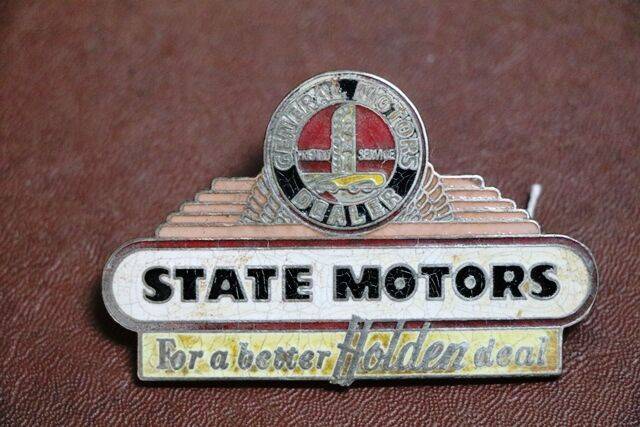 GM Dealer State Motors Enamel Badge. | XXXX Antique Complex
