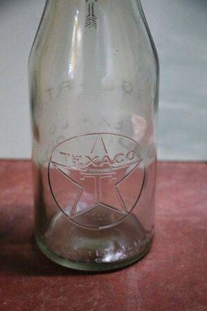 Genuine Texaco Embossed 1 quart Oil Bottle. | XXXX Antique Complex