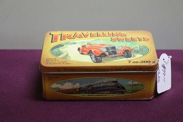 A Vintage Traveling Sweets Pictorial Tin. | XXXX Antique Complex