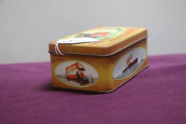 A Vintage Traveling Sweets Pictorial Tin. | XXXX Antique Complex