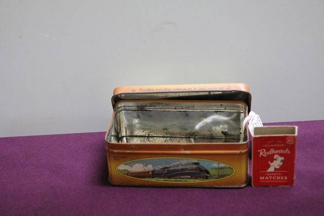 A Vintage Traveling Sweets Pictorial Tin. | XXXX Antique Complex